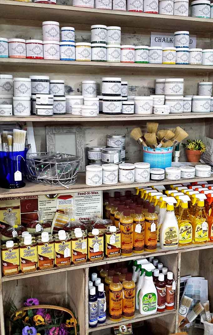 Rows of chalk paint and furniture polish await DIY enthusiasts looking to breathe new life into vintage finds.