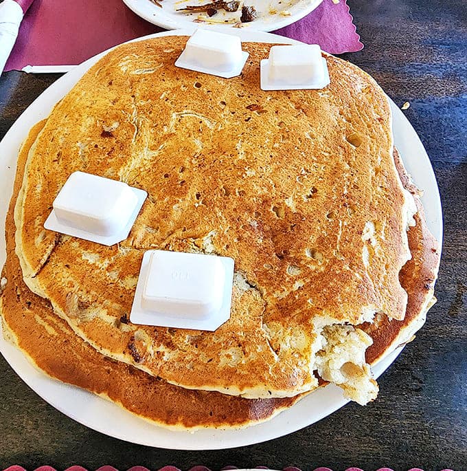 When pancakes require their own area code and butter melts into golden pools of happiness, you know you've found breakfast nirvana.