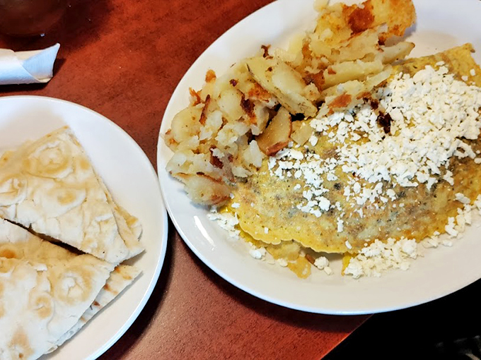 The best of both worlds unite! This fluffy omelet, stuffed with savory gyro meat, is a breakfast revolution wrapped in eggy perfection.