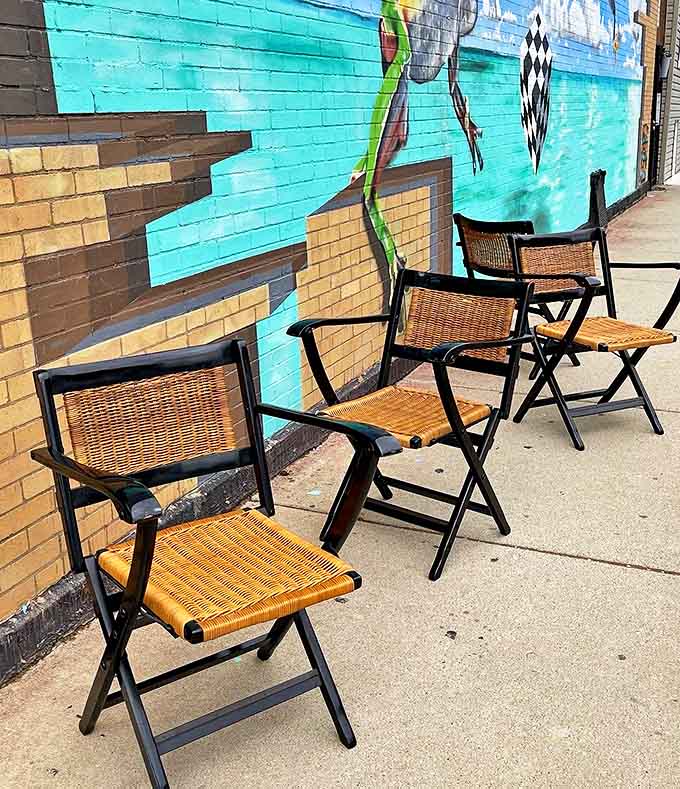 Eames-style lounge chairs demand attention &ndash; these aren't just seats, they're sculptural statements that defined an era of design.