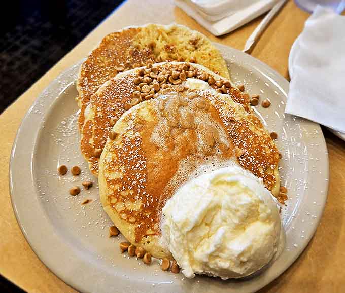 Golden, fluffy pancakes topped with melting butter and a dusting of powdered sugar &ndash; breakfast doesn't get more photogenic or delicious than this.