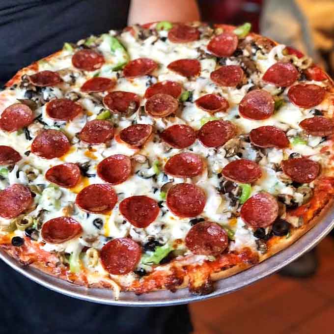This isn't just cheese and toppings on dough &ndash; it's an edible art form where each ingredient plays its part in a symphony of flavor.