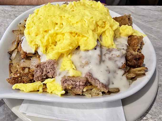 Behold the legendary skillet &ndash; a mountain of breakfast goodness where eggs, meat, and potatoes unite in perfect harmony.