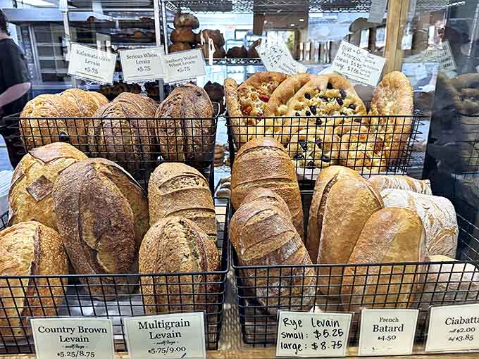 Bread architecture at its finest! These crusty loaves with their open, airy crumb structure would make any carb-lover weak at the knees.