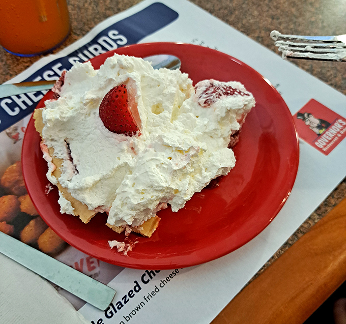This strawberry cream pie isn't just dessert, it's a towering achievement that makes you question why you'd ever waste calories on lesser sweets.