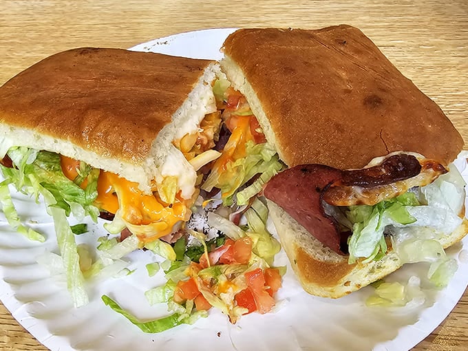 This isn't just a sub &ndash; it's an architectural marvel of layered meats, cheese, and veggies that requires strategic planning before that first glorious bite.