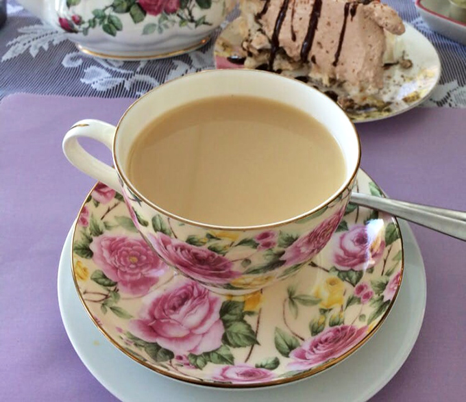Not just any cuppa &ndash; tea is served in vintage china cups adorned with hand-painted roses, making every sip feel like a royal indulgence.