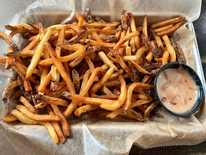 These aren't just fries &ndash; they're a religious experience. Hand-cut, truffle-kissed, and served with a side of food euphoria.