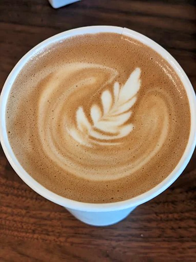 Coffee art so beautiful you almost don't want to drink it. Almost. That first sip changes everything.