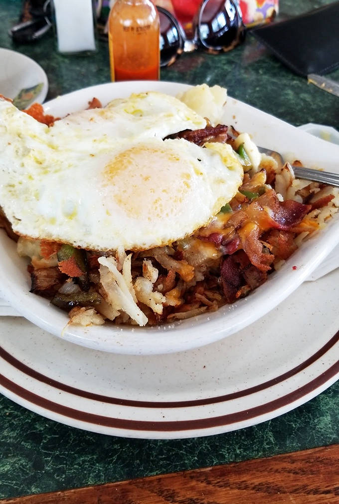 The legendary bacon skillet comes loaded with crispy hash browns, savory bacon, and perfectly cooked eggs for a breakfast that satisfies on every level.