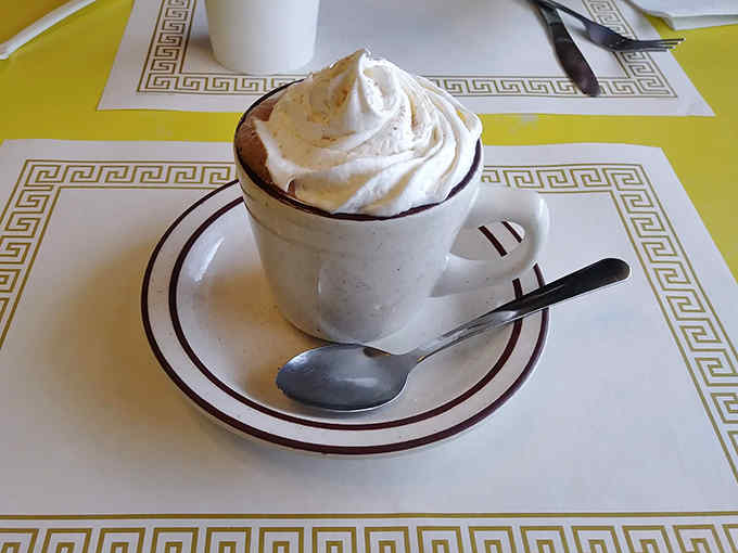 This isn't just hot chocolate&mdash;it's a warm hug in a mug, topped with a cloud of real whipped cream swirled to perfection.