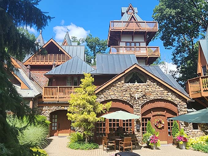 Landoll's Mohican Castle blends fairy tale charm with rustic elegance, its wooden balconies and stone walls creating a magical retreat.