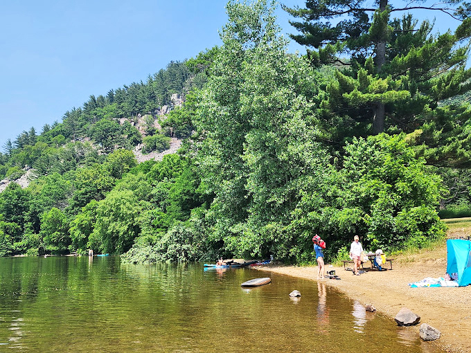 Ancient bluffs meet serene waters in a landscape that screams "epic movie scene." Just add dragons for the full fantasy experience.