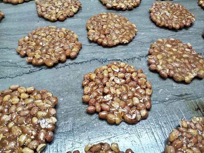 Peanut fritters bring that perfect sweet-and-salty combination, crunchy clusters that disappear faster than you can say "just one more."