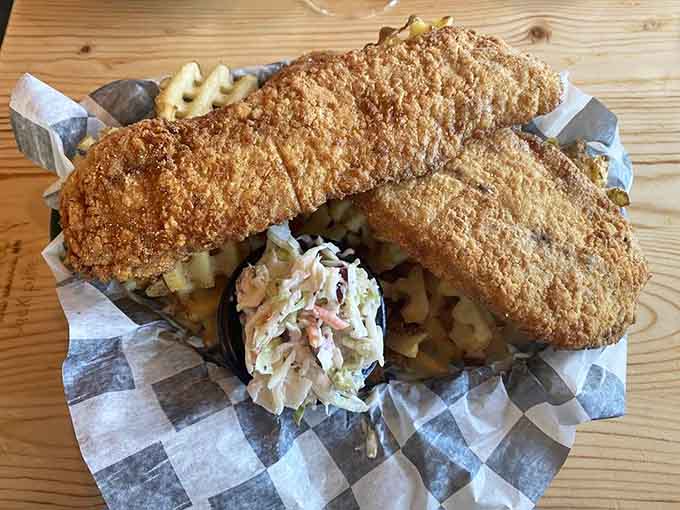 Golden, crispy fish and chips that would make any British pub jealous, served with a side of waffle fries.