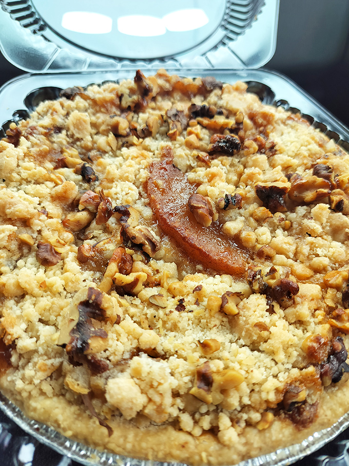 The Caramel Apple Walnut pie showcases fall's finest flavors &ndash; tart apples, buttery caramel, and crunchy walnuts dancing together in perfect harmony.