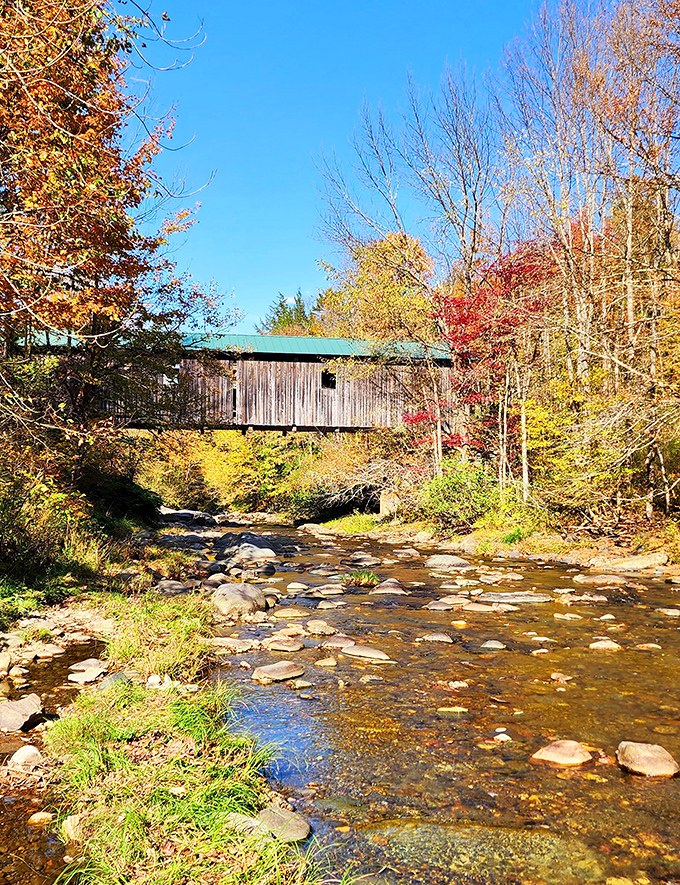 Fall in Vermont isn't just a season &ndash; it's a performance. This covered bridge framed by autumn foliage is basically showing off.
