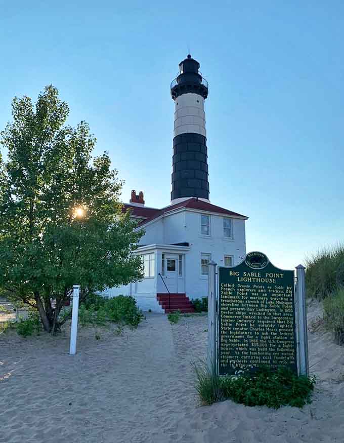 Standing tall since 1867, this black-and-white striped sentinel has witnessed countless sunsets and saved countless sailors.