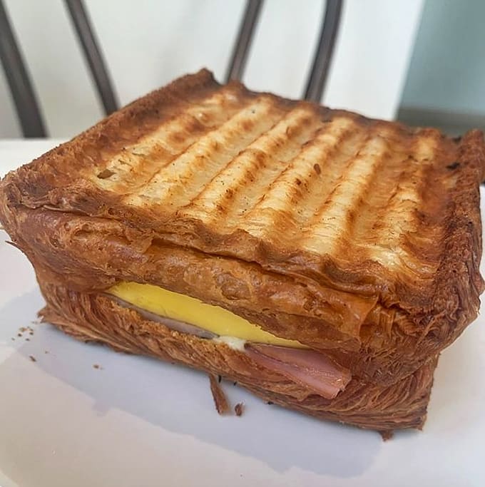 When a croissant meets ham and cheese, beautiful things happen in pastry form.