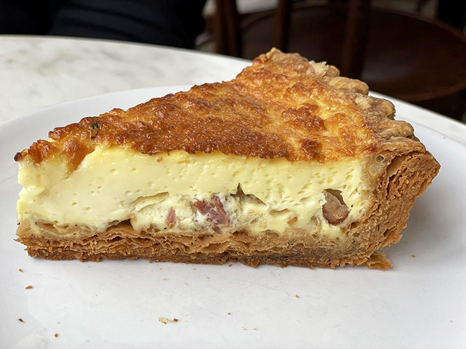 Ham studded throughout silky custard in a crust that could make angels weep, this is breakfast done absolutely right.