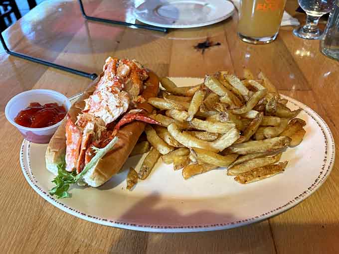 This close-up reveals the generous portion of sweet, tender lobster meat that makes Blaze's signature roll absolutely unforgettable.