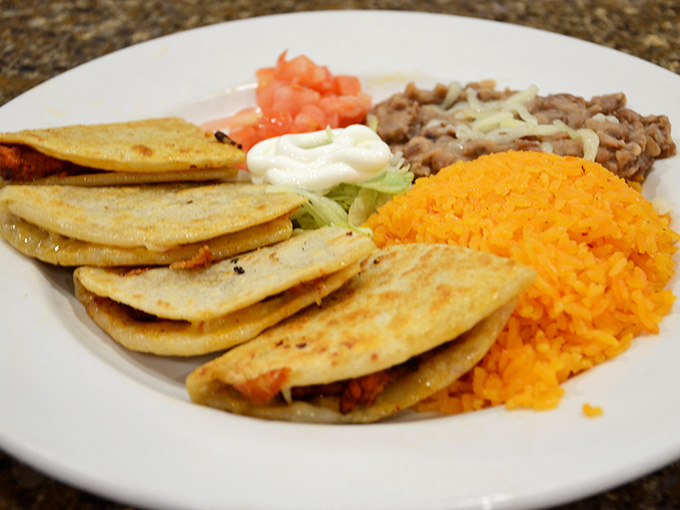 When your taco dinner comes with rice, beans, and perfectly seasoned meat, you know you've found the real deal.