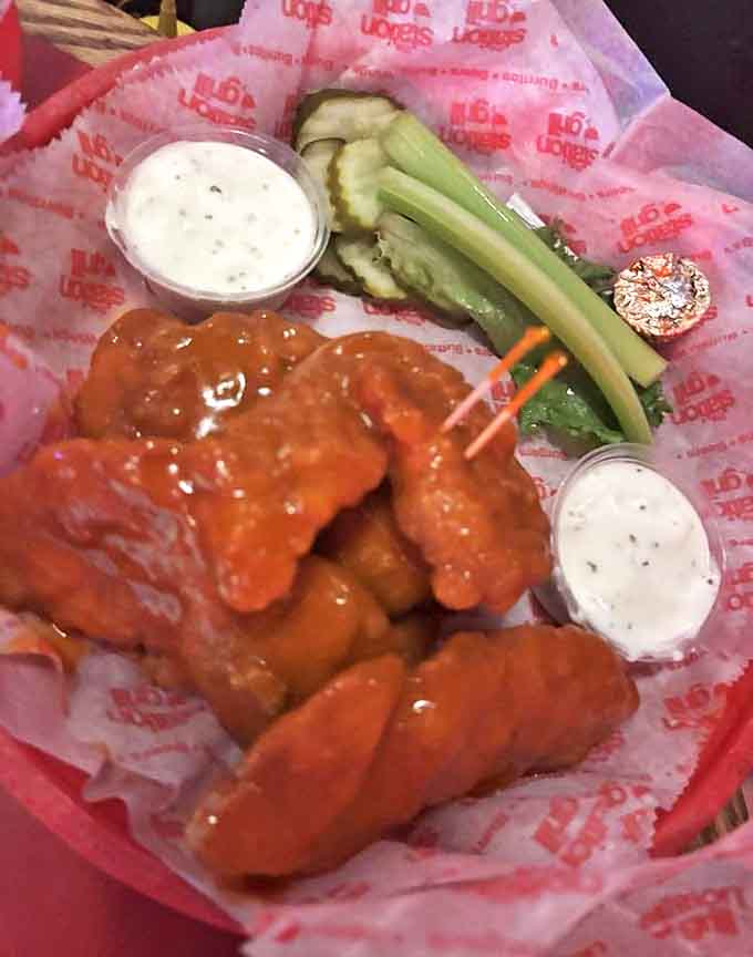 Boneless wings bring all the flavor without the finger-licking commitment, perfect for those who want the buffalo experience with slightly better table manners and less napkin carnage.