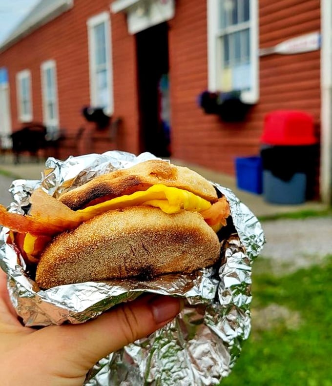 Breakfast nirvana wrapped in foil &ndash; a golden English muffin barely containing the melty cheese and perfectly cooked egg within.