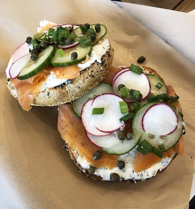 Salmon, cream cheese, and fresh vegetables on a house-made bagel&mdash;a combination so perfect it should have its own national holiday.
