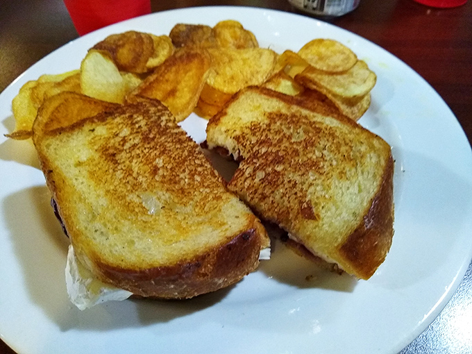 Golden, crispy, and oozing with melty goodness. Paired with homemade chips, it's childhood comfort food with grown-up execution.