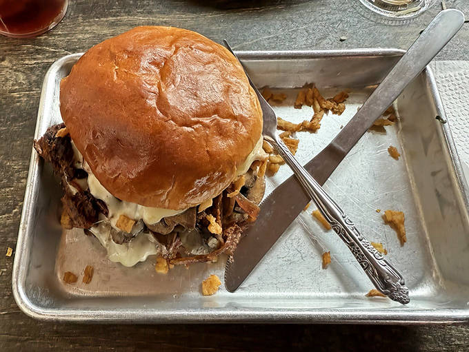 The Bodacious Brisket Burger in all its glory &ndash; a tower of flavor that makes you question why all burgers can't taste this good.