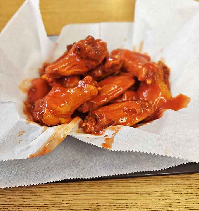 These aren't just wings; they're little sauce-slathered masterpieces that make you question why you'd eat chicken any other way.