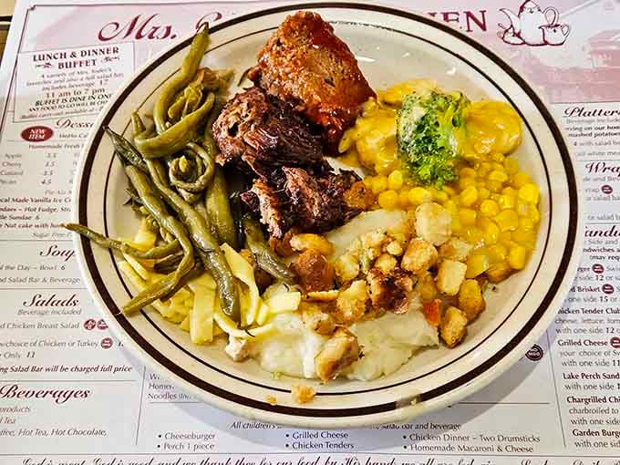 Behold a plate piled high with fried chicken, mashed potatoes, and sides that represent everything right with comfort food.