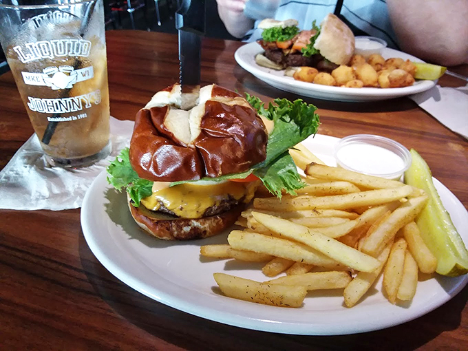This isn't just a burger, it's a tower of flavor that'll make your taste buds do a happy dance. The fries? They're the burger's crispy backup dancers.