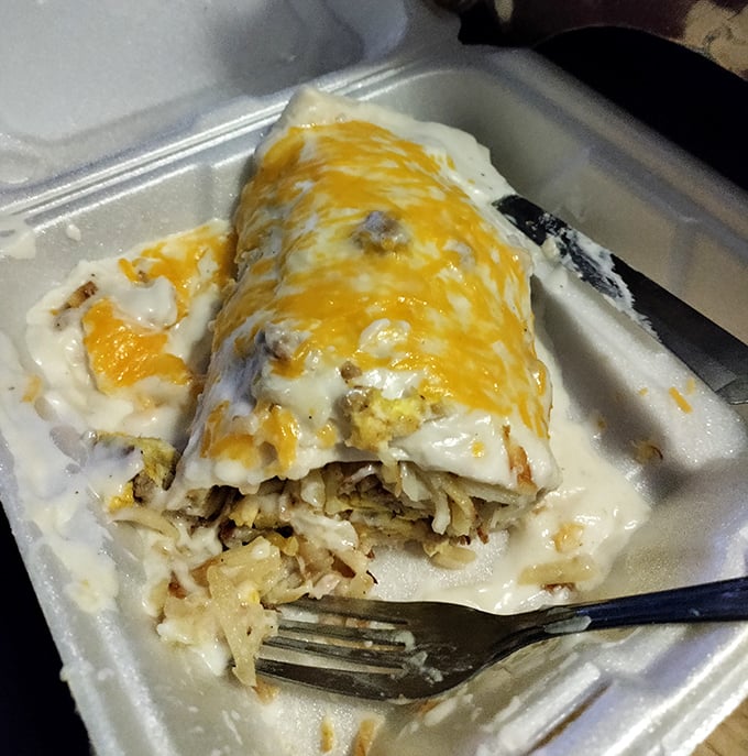 Breakfast burrito nirvana! Eggs, sausage and hash browns wrapped up and smothered in gravy and cheese &ndash; morning bliss in portable form.