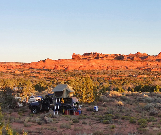 Camping beneath billion-year-old rock formations, the ultimate five-billion-star accommodation experience.