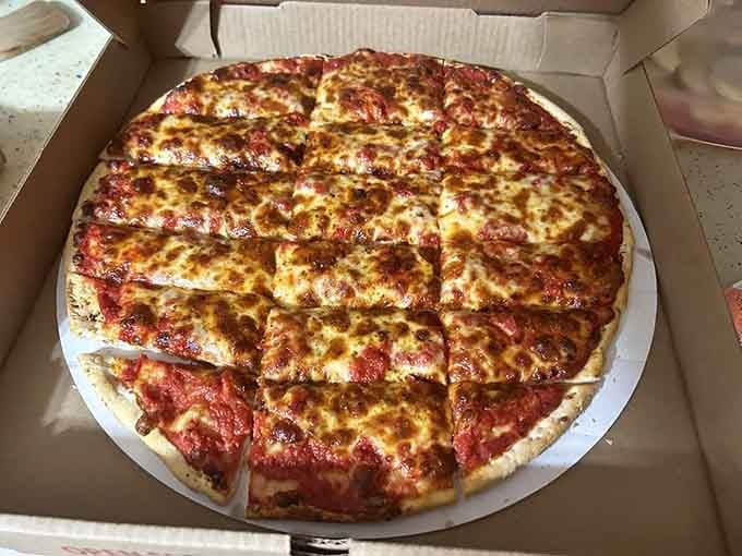 Sometimes simple is best, and this cheese pizza proves that quality ingredients don't need fancy toppings to shine.