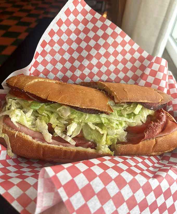 The Italian sub doesn't believe in holding back, loaded with enough meats and toppings to require strategic bite planning and possibly a nap afterward.