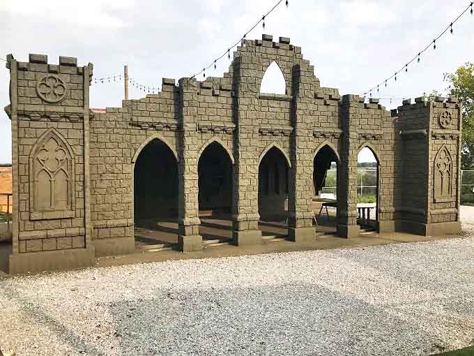 Medieval architecture meets modern scares at this stone castle facade, where even the bravest knights would think twice before entering.