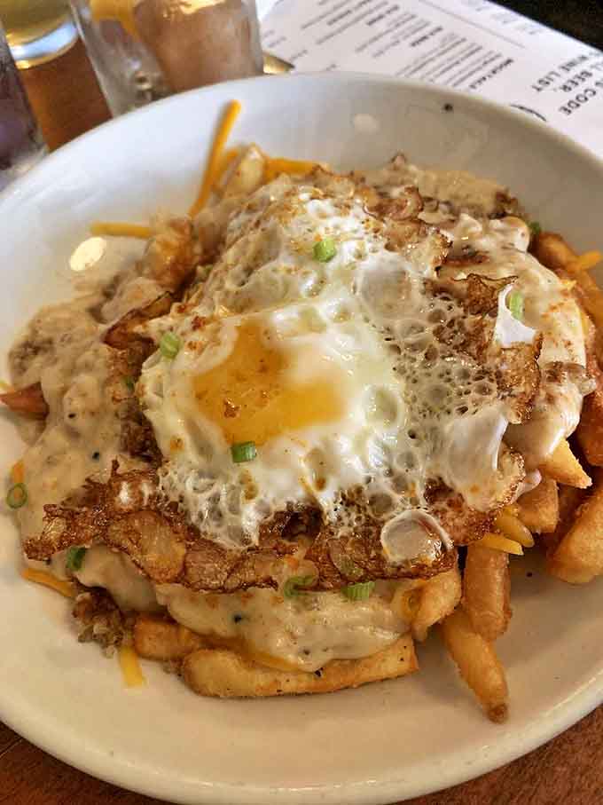 Cincinnati's take on poutine elevates the humble french fry to star status &ndash; crispy potatoes smothered in gravy and topped with a perfectly fried egg.