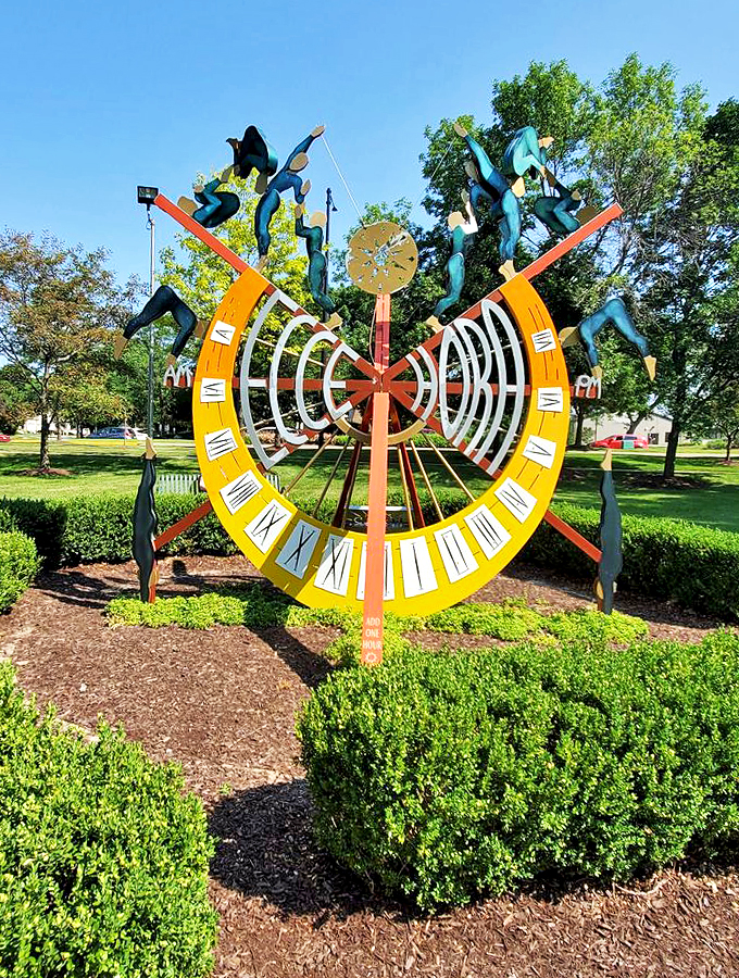 Clock Sculpture Time literally dances in this whimsical sculpture, where figures pirouette around a sundial in perpetual celebration.