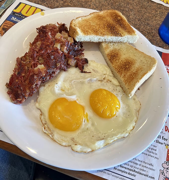 Corned beef hash and eggs: where crispy meets tender in a breakfast romance that'll make you forget all other breakfast relationships.