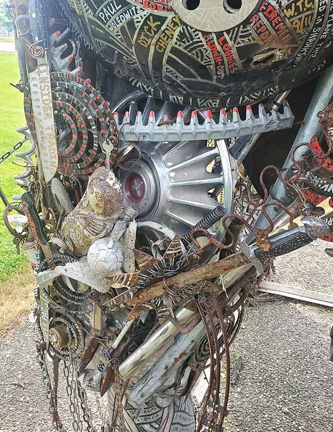 Up close, the elephant's "skin" tells a story of transformation, where old gears and metal scraps become something alive and wonderful.