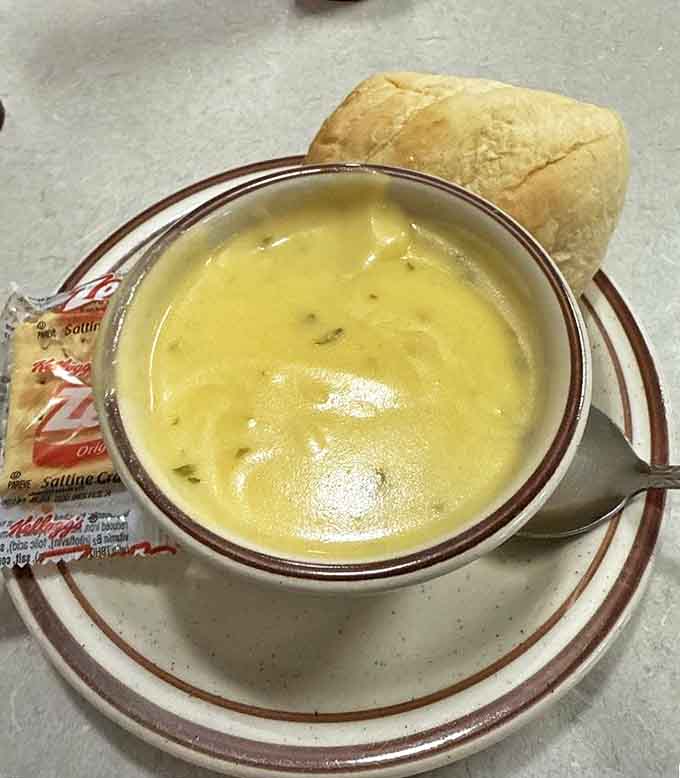 This cream soup isn't just a side &ndash; it's liquid comfort in a bowl, with a roll standing by for essential dipping duties.