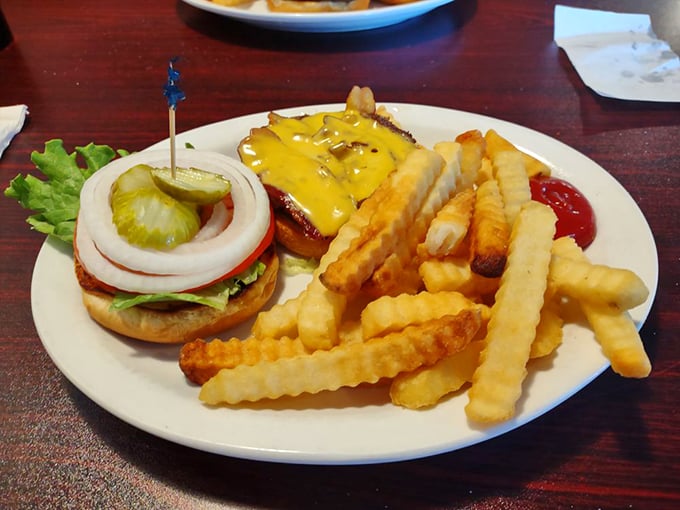 Behold the dynamic duo: a burger that means business and home fries that steal the show. Your taste buds are in for a treat!