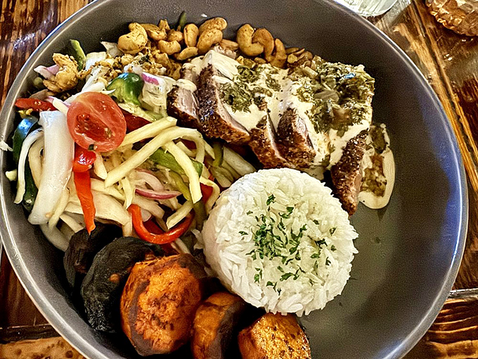 Datil-dusted tuna bowl: Rare tuna gets the royal treatment with coconut rice, papaya slaw, and that signature St. Augustine heat.