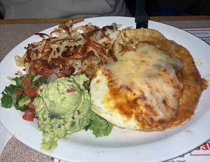 This plate of Huevos Rancheros comes with hash browns that could convert even the most devoted pancake enthusiast.