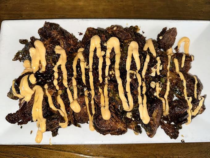 These Brussels sprouts get the Bangkok treatment with a sauce drizzle that transforms vegetables into something you'll actually fight over.