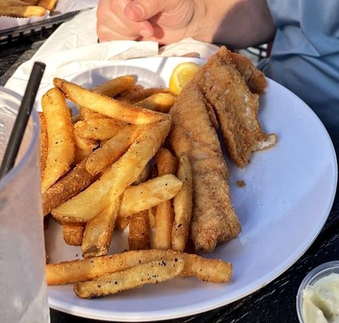 Golden fried walleye with crispy fries delivers that satisfying crunch that makes you understand why people drive hours for this.