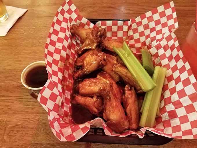 When your wings arrive in a basket this generous, you know you're in for a good time and possibly a food coma.